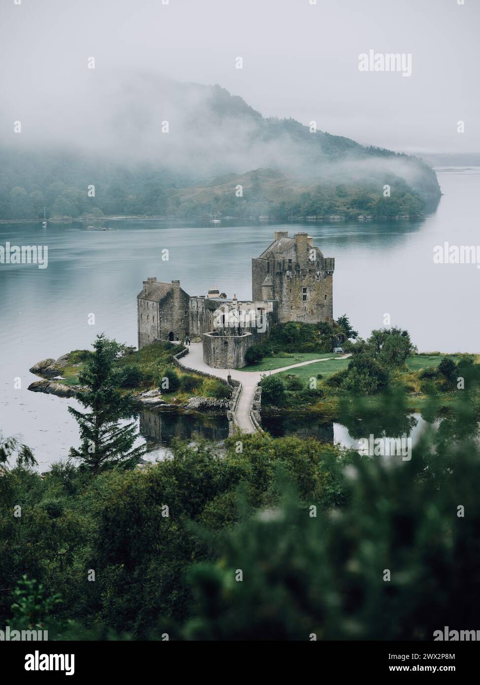 Eilean Donan Castle landscape in low cloud in Dornie, Kyle of Lochalsh ...
