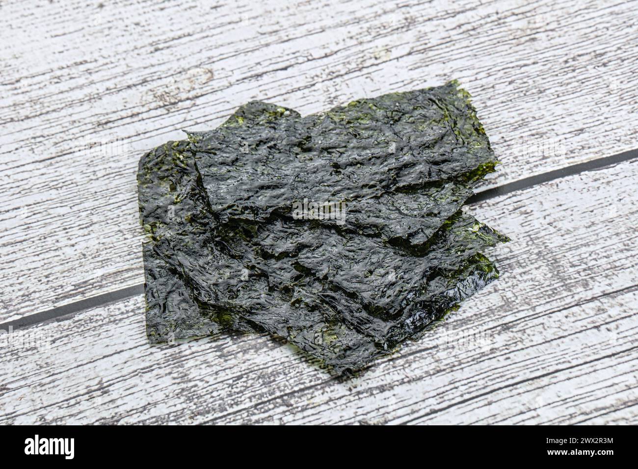 Korean nori seaweed chips heap snack Stock Photo - Alamy