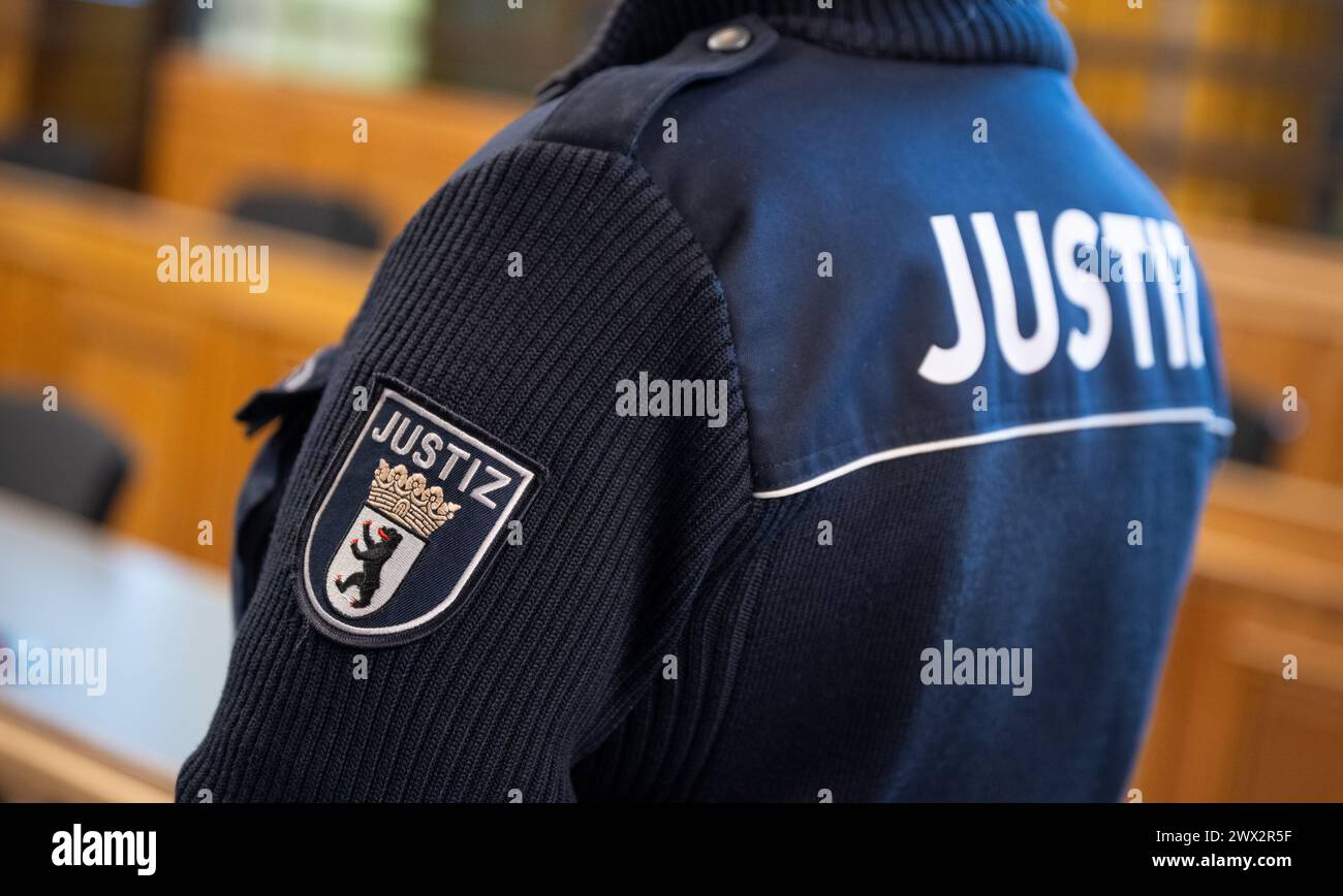 PRODUCTION - 27 March 2024, Berlin: The word "Justiz" (justice) and a ...