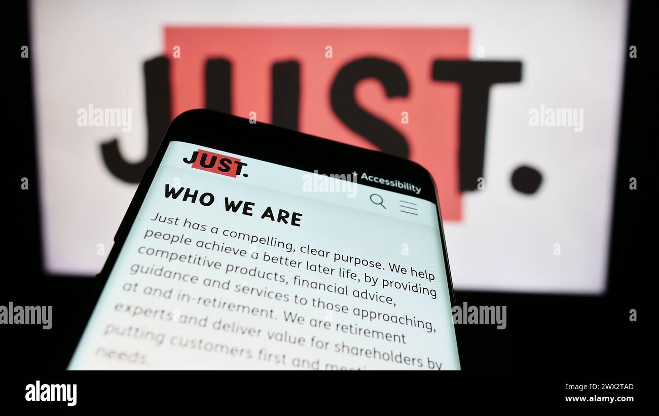 Smartphone with webpage of British financial services company Just ...