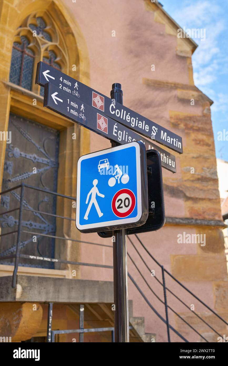 Road sign and signpost to places of interest in the old town of Colmar ...