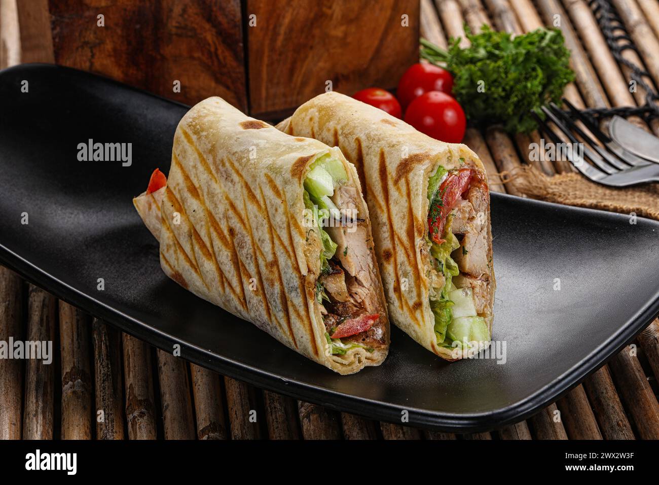 Chicken doner wrap with meat and vegetables Stock Photo - Alamy