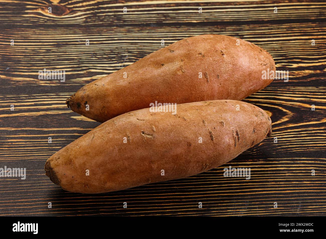 Raw ripe batat root for baked Stock Photo - Alamy