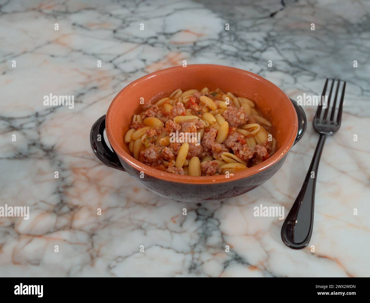 malloreddus or Sardinian gnocchetti, typical Sardinian pasta, with wild ...