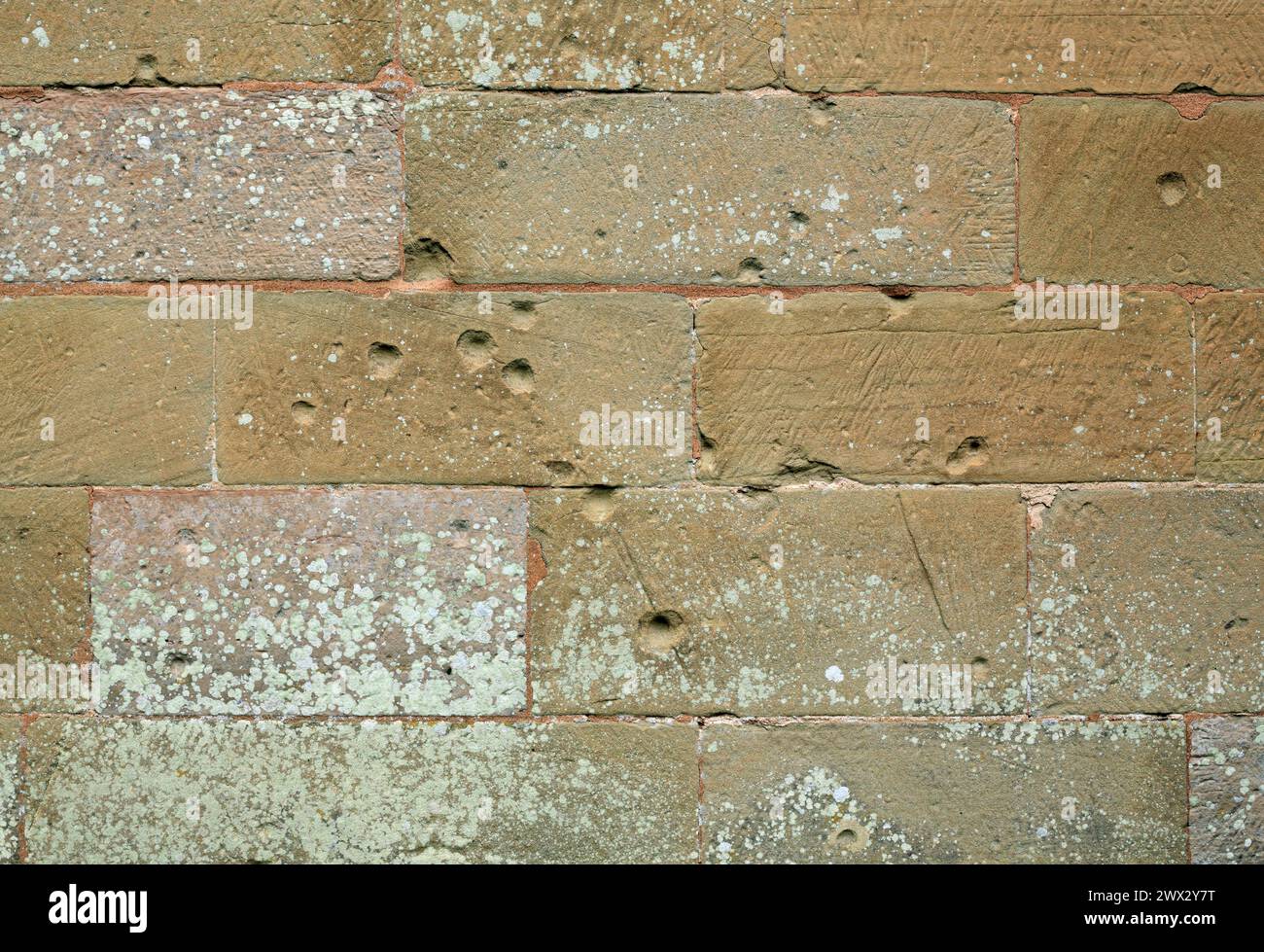 English civil war musket shot marks on the wall of St Peter's church ...