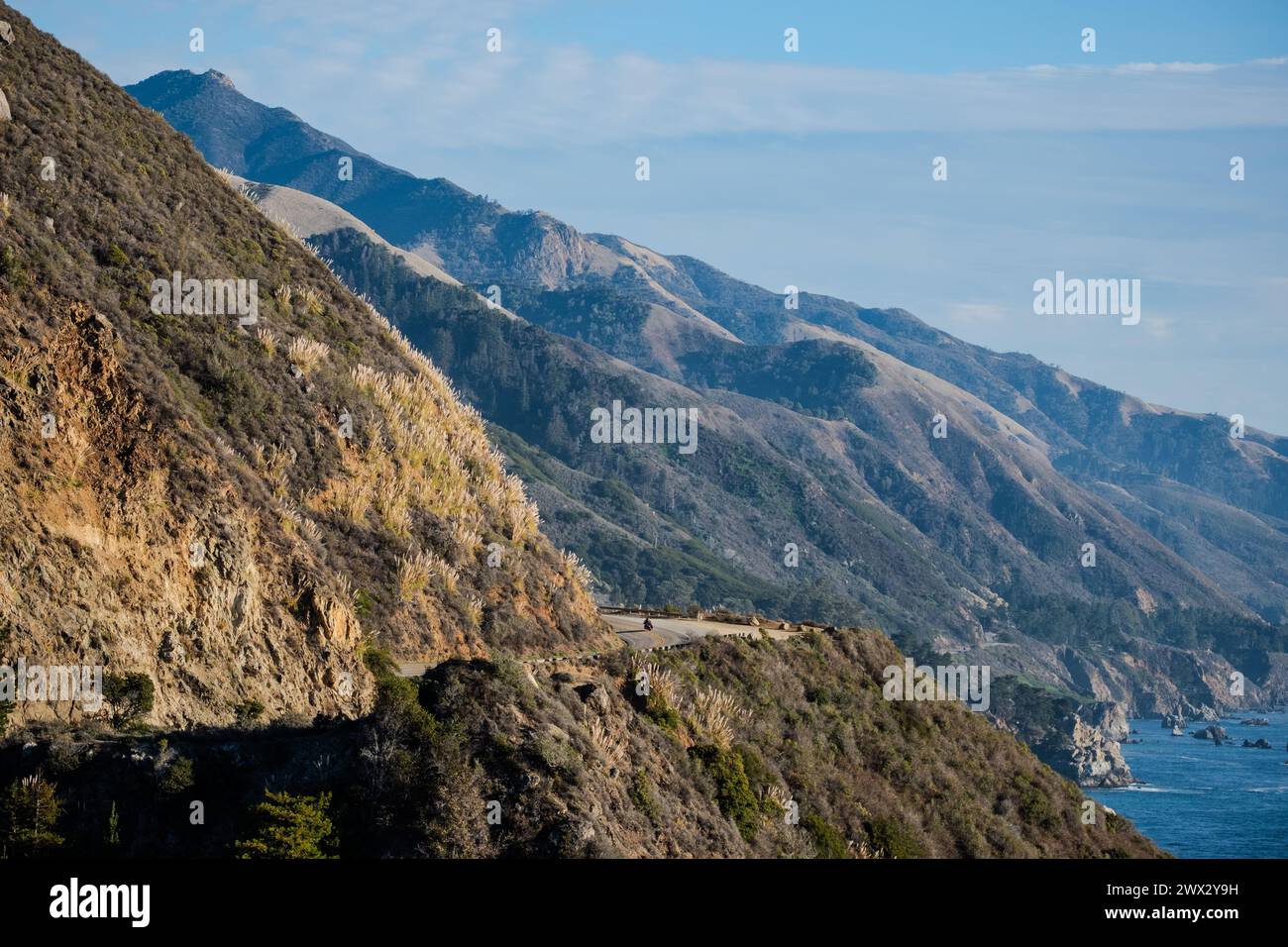 Motorcycle navigates Route 1, the Pacific Coast Highway, in Big Sur ...