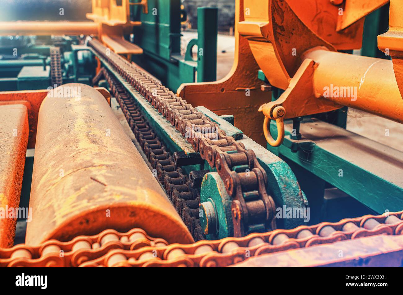 Front view old chain transmission mechanism. Rusty bearings, cardan ...