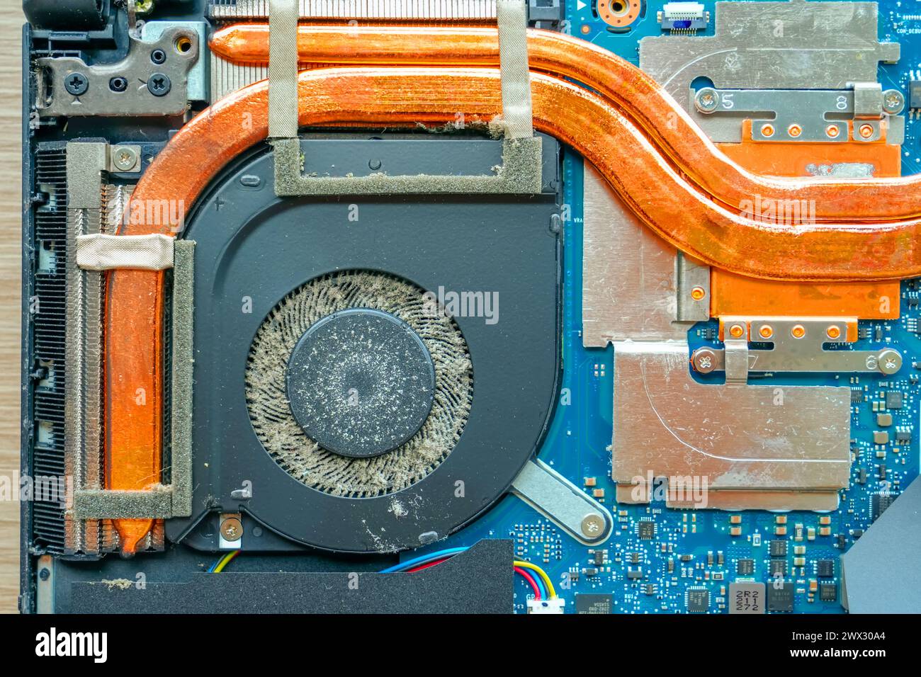 Close up old disassembled laptop after cleaning the cooler system ...
