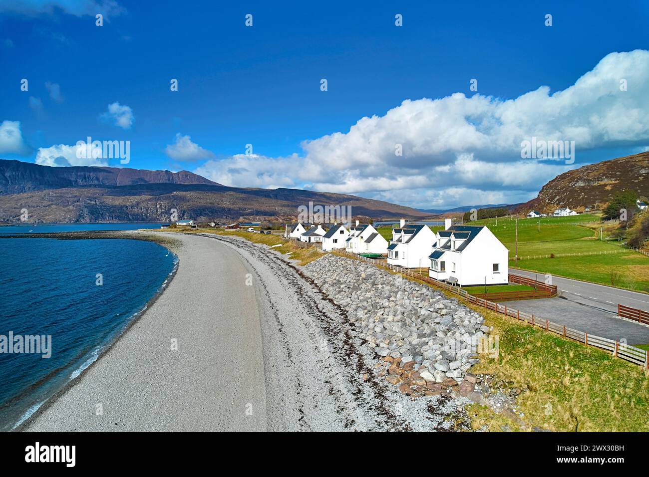 Ardmair Wester Ross Scotland blue sky the grey pebble beach white ...