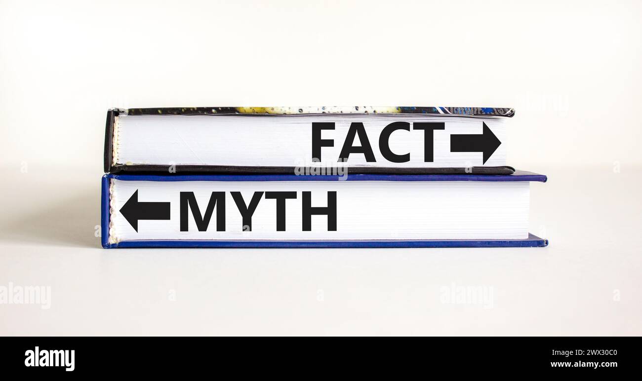Fact or myth symbol. Concept word Myth and Fact on beautiful books ...