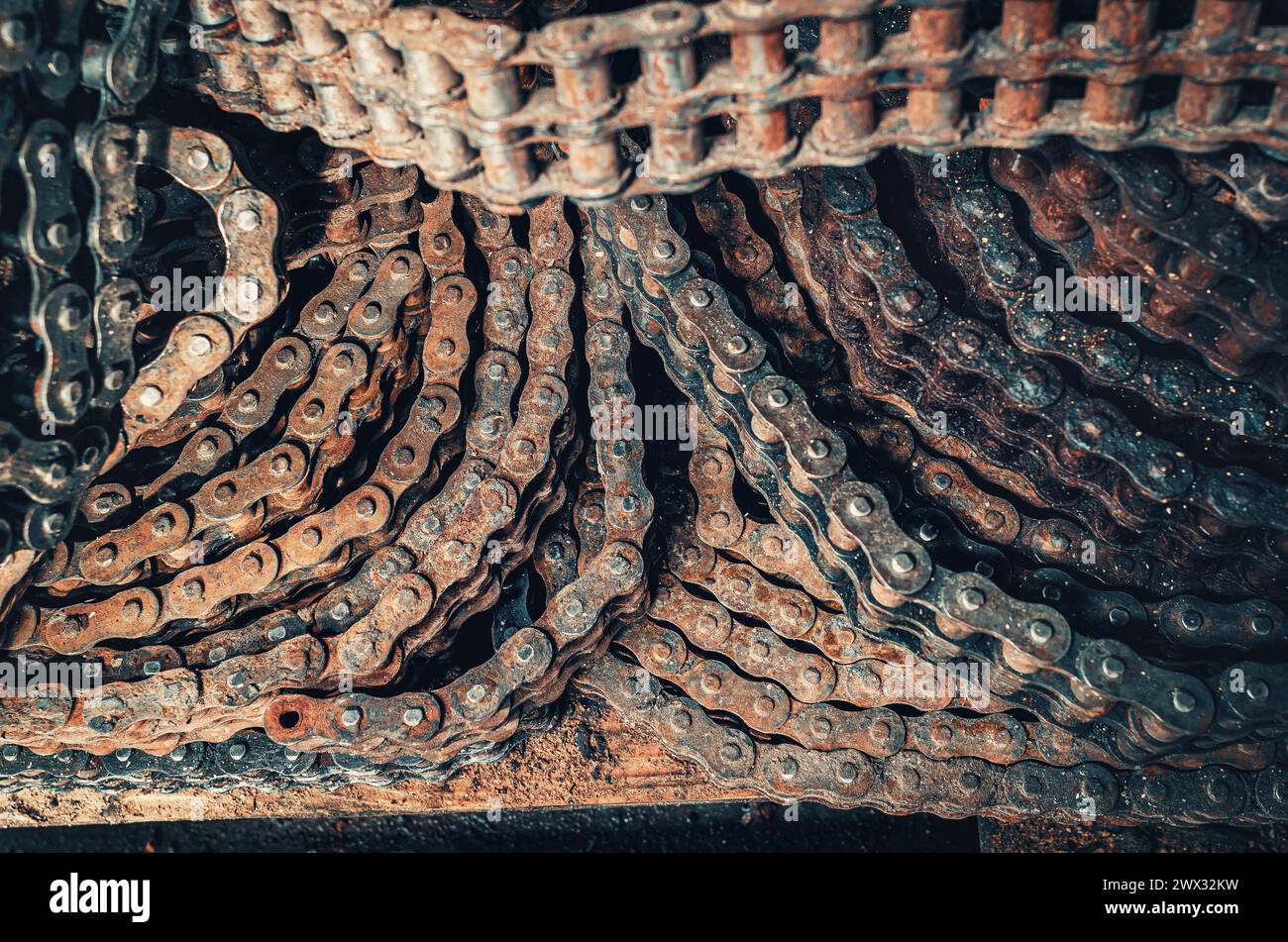 Old chain transmission mechanism. Rusty bearings, cardan shaft, gear ...