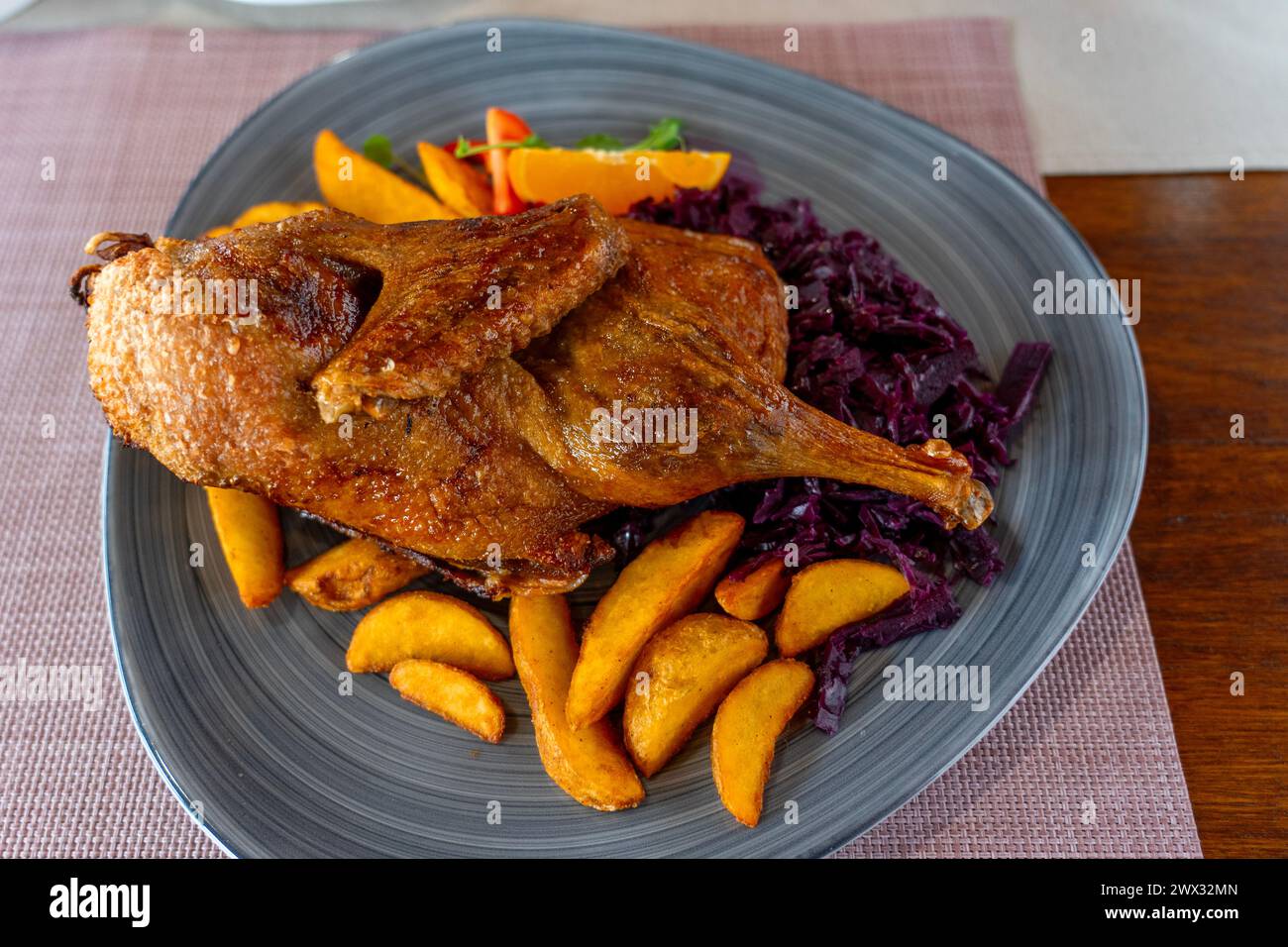roasted half duck with red cabbage traditional hungarian dish Stock ...
