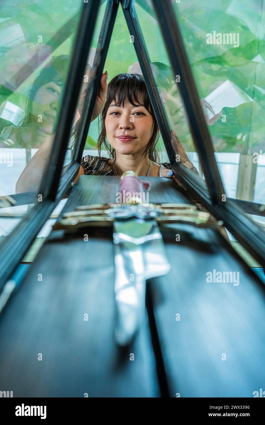 London, UK. 27 Mar 2024. Charlotte Mei with her work, Sword Fragments ...