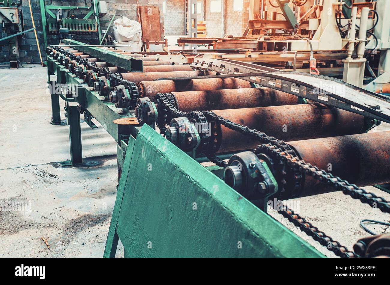 Corroded parts of old broken transmission close-up. Rusty metal chain ...