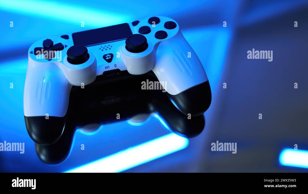 Gamepad on abstract background with light effects. Gamer and Game ...