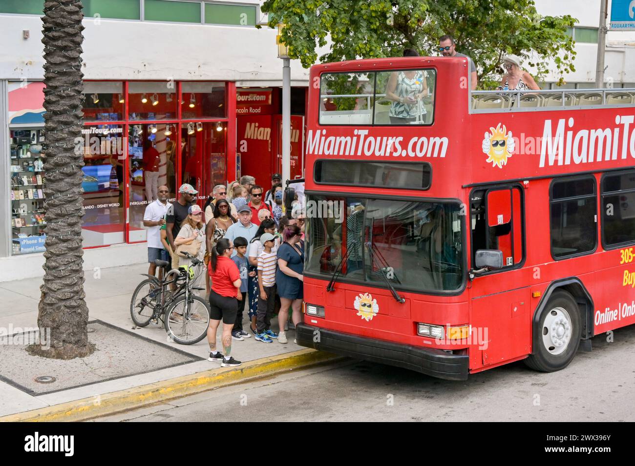 Miami Beach, Miami, Florida, USA - 1 December 2023: People queuing to ...