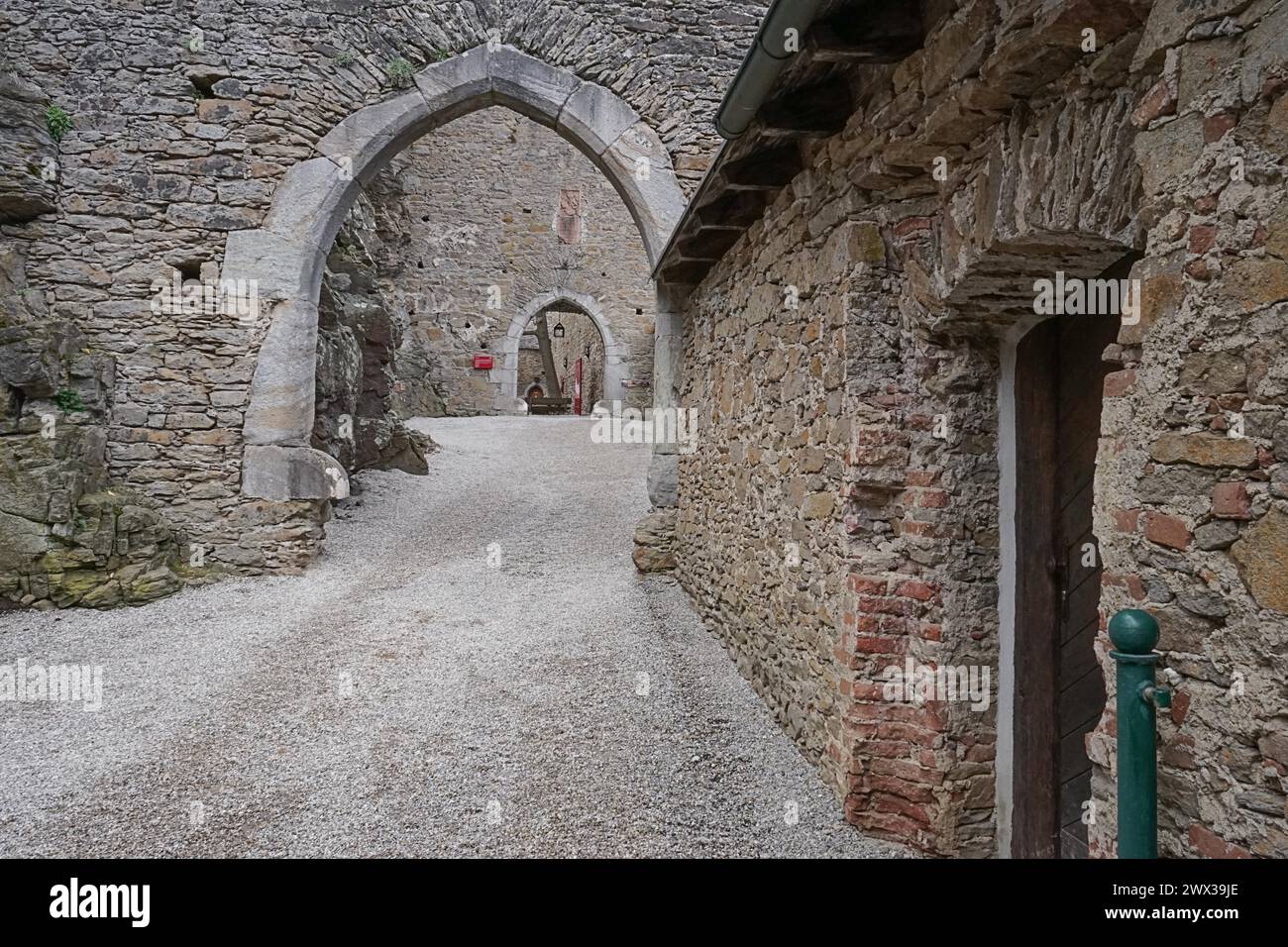 Old passageway with stone arch in a medieval castle Aggstein castle ...