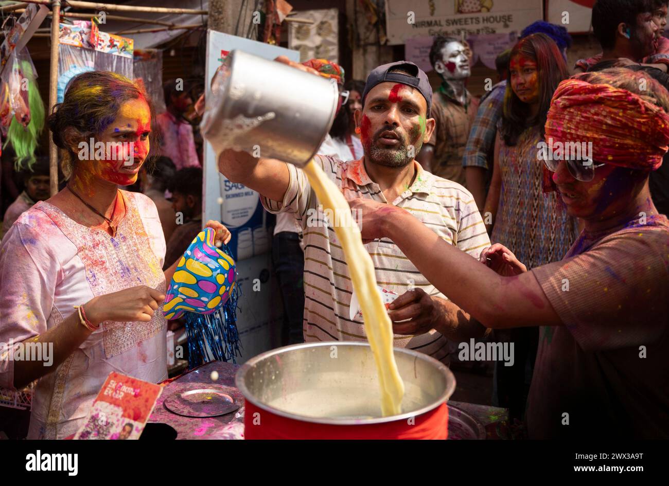 A person selling bhang lassi on a street, during the holi festival, the Hindu spring festival of ...