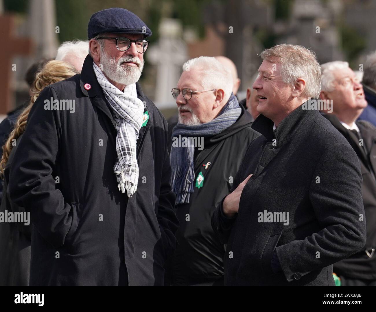 Former Sinn Fein president Gerry Adams (left) with Nicky Kelly (centre ...