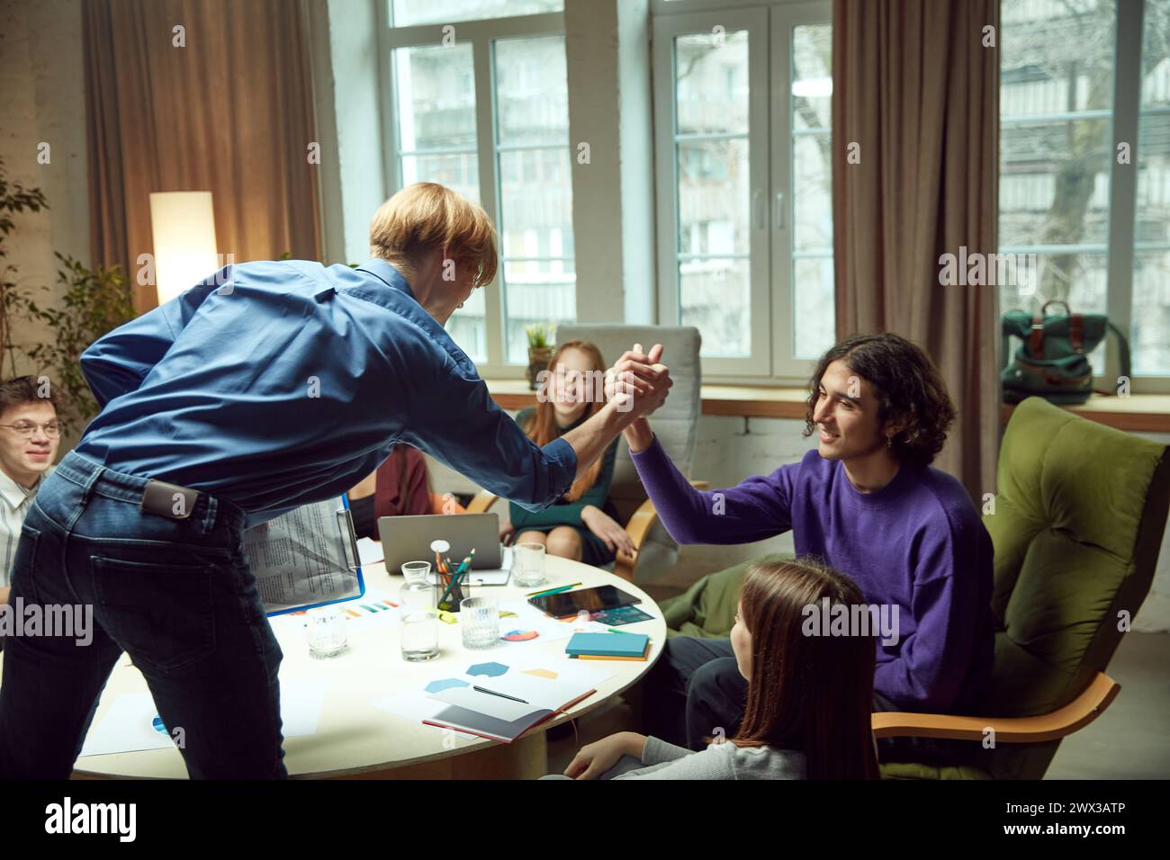 Good job. Motivated young people, students meeting in library for ...