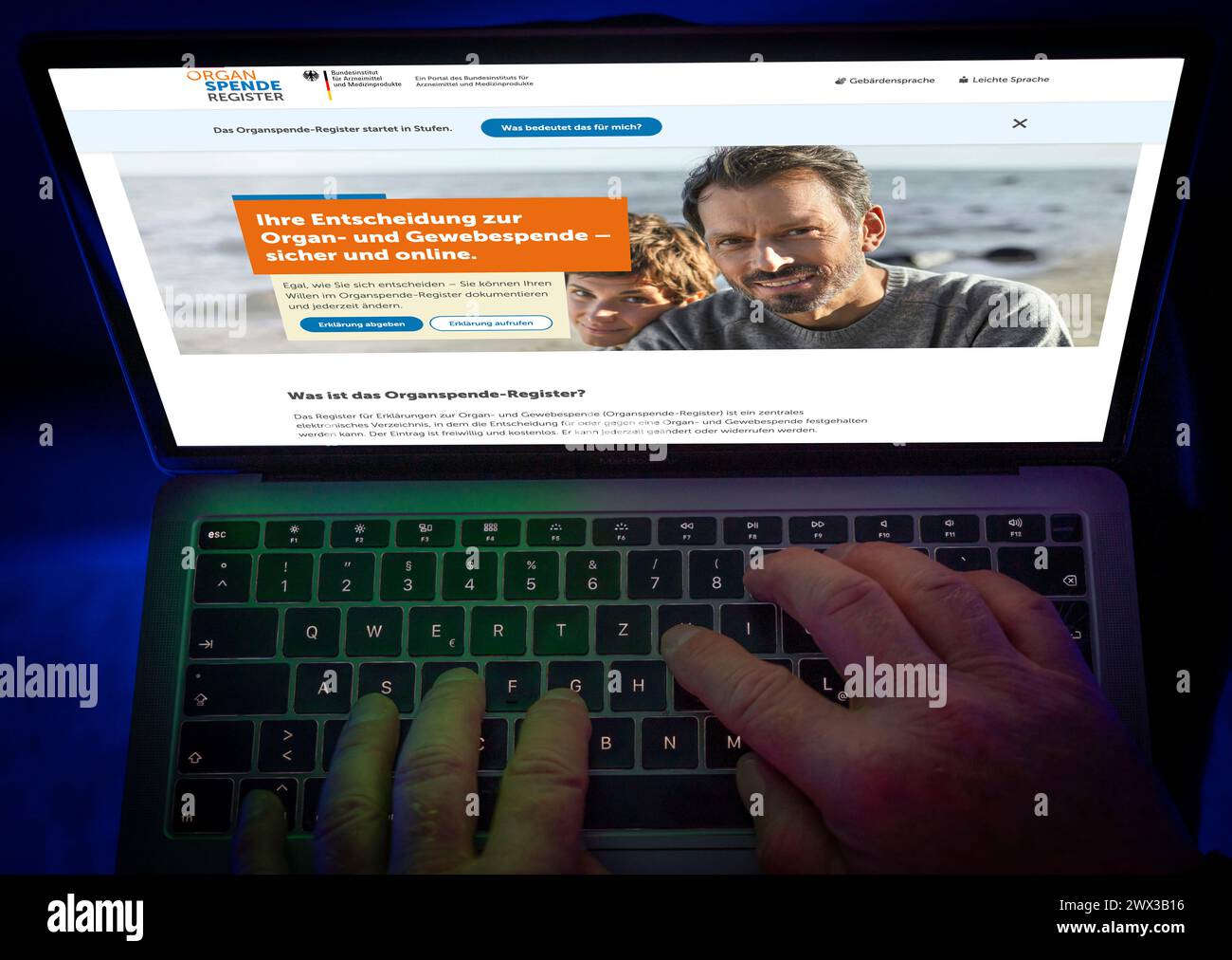 Symbolic image of organ donation register, person informs himself about ...