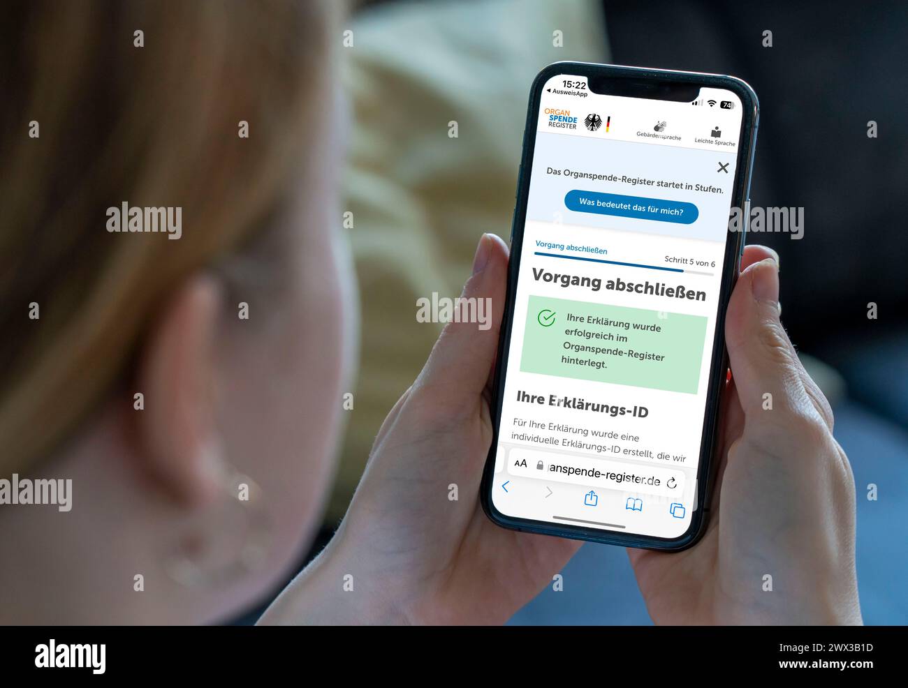 Symbolic image of organ donation register, person informs himself about ...