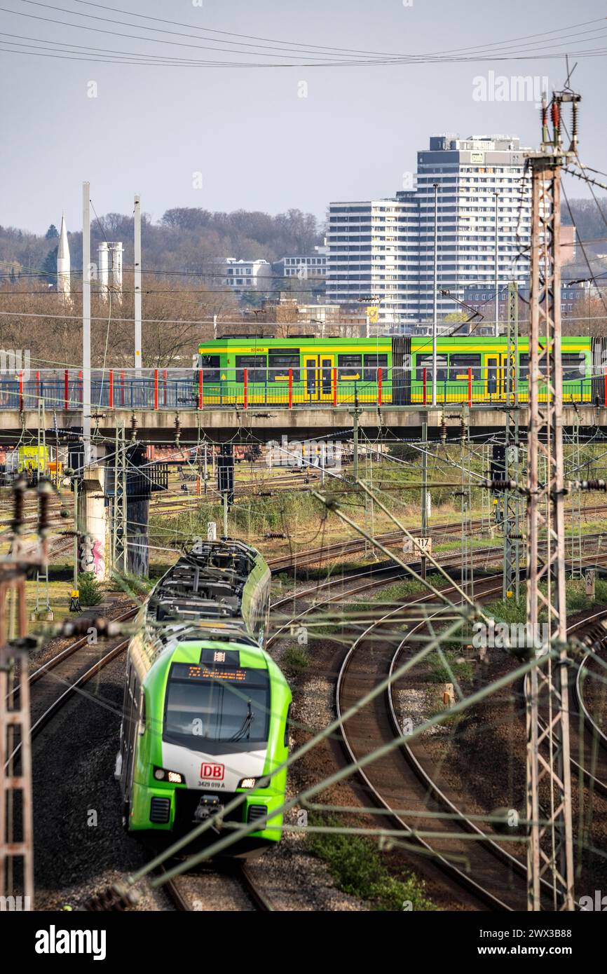 Streetcar line 112 on bridge, S-Bahn train on the railroad line between ...