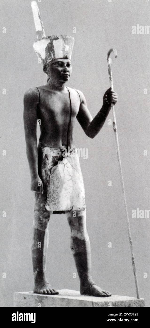 Ancient egyptian wooden sculpture statue hi-res stock photography and ...