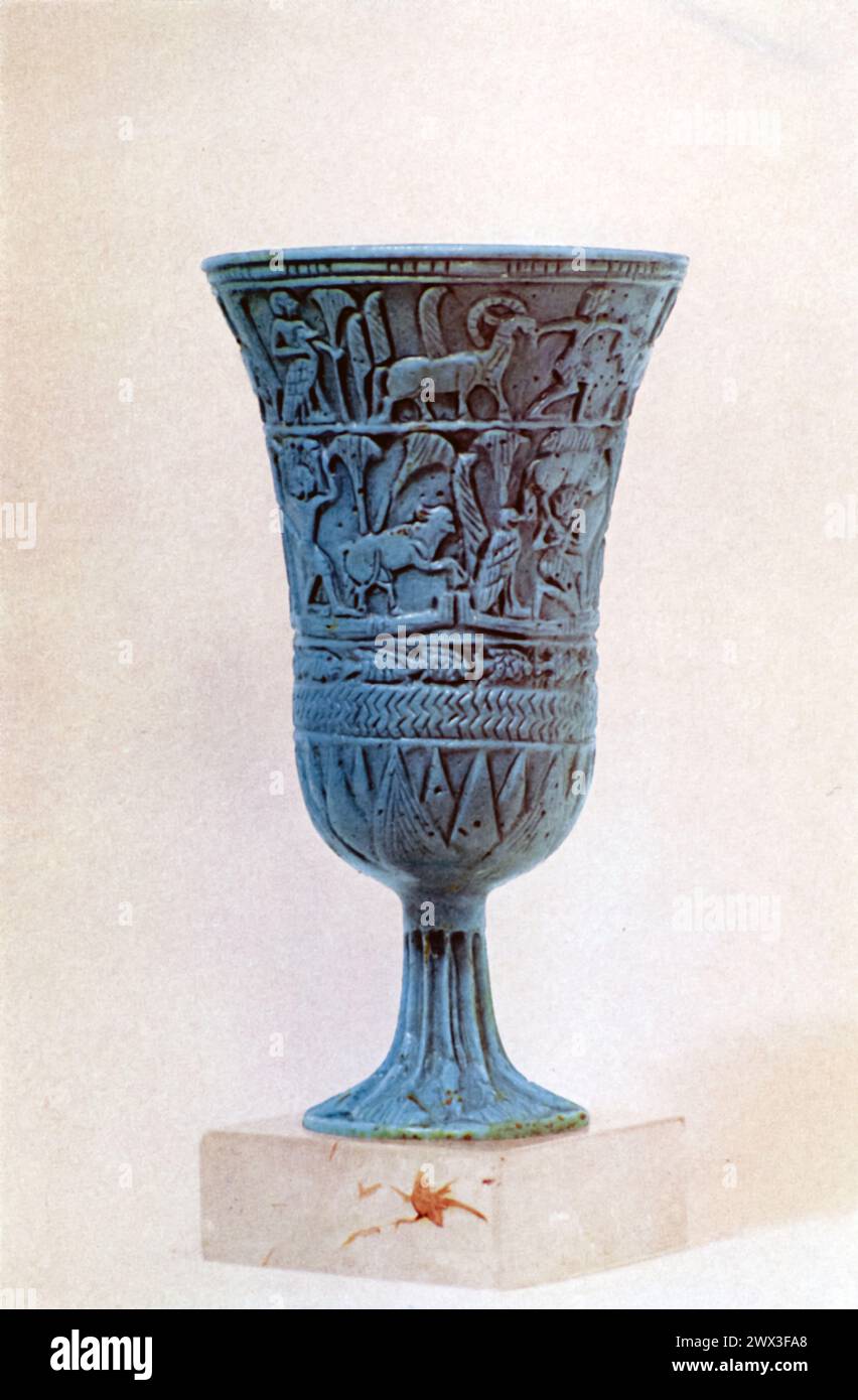 a lotiform cup made from faience, dating to the XIX-XX Dynasty of Egypt ...