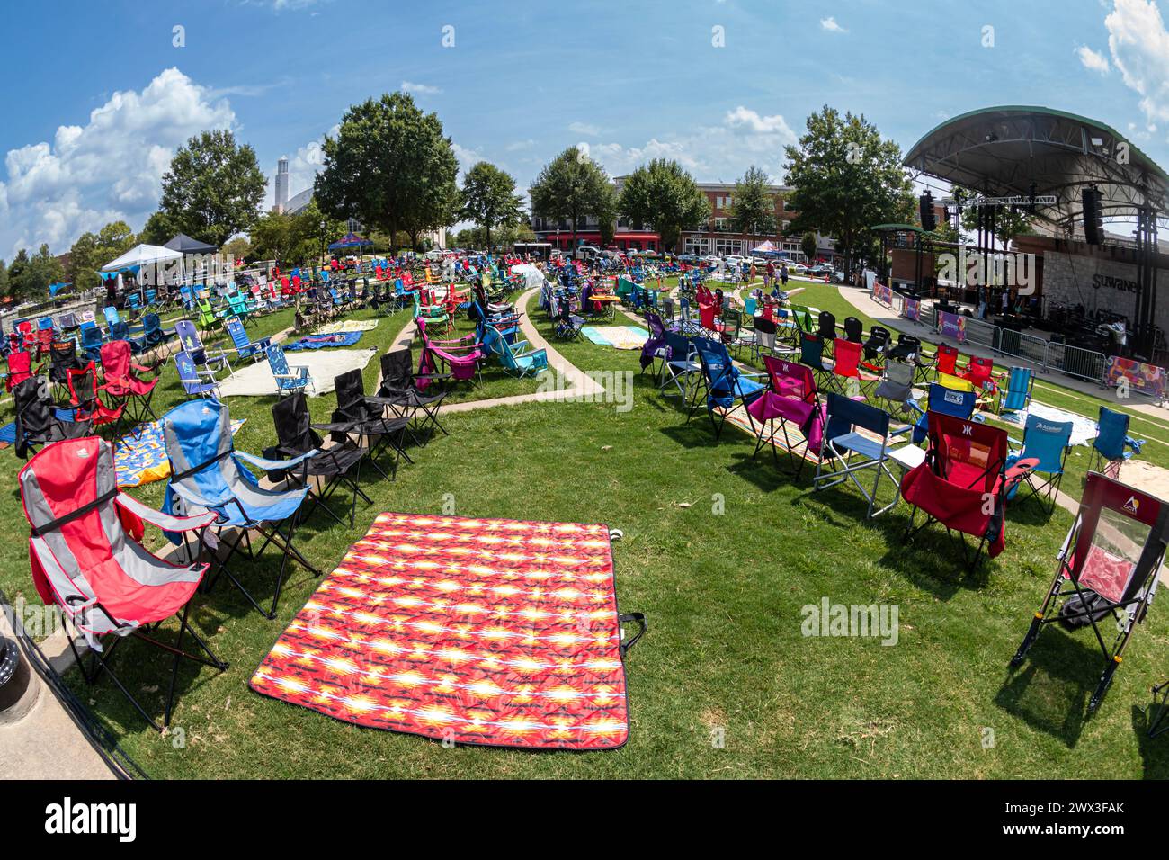 Suwanee, GA / USA - August 12, 2023: Dozens of empty lawn chairs are ...