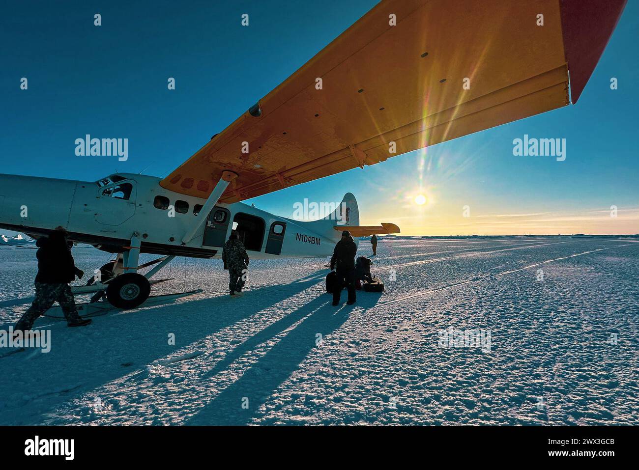 Usa. 23rd Feb, 2024. Personnel from the Arctic SubMarchine Lab survey a ...