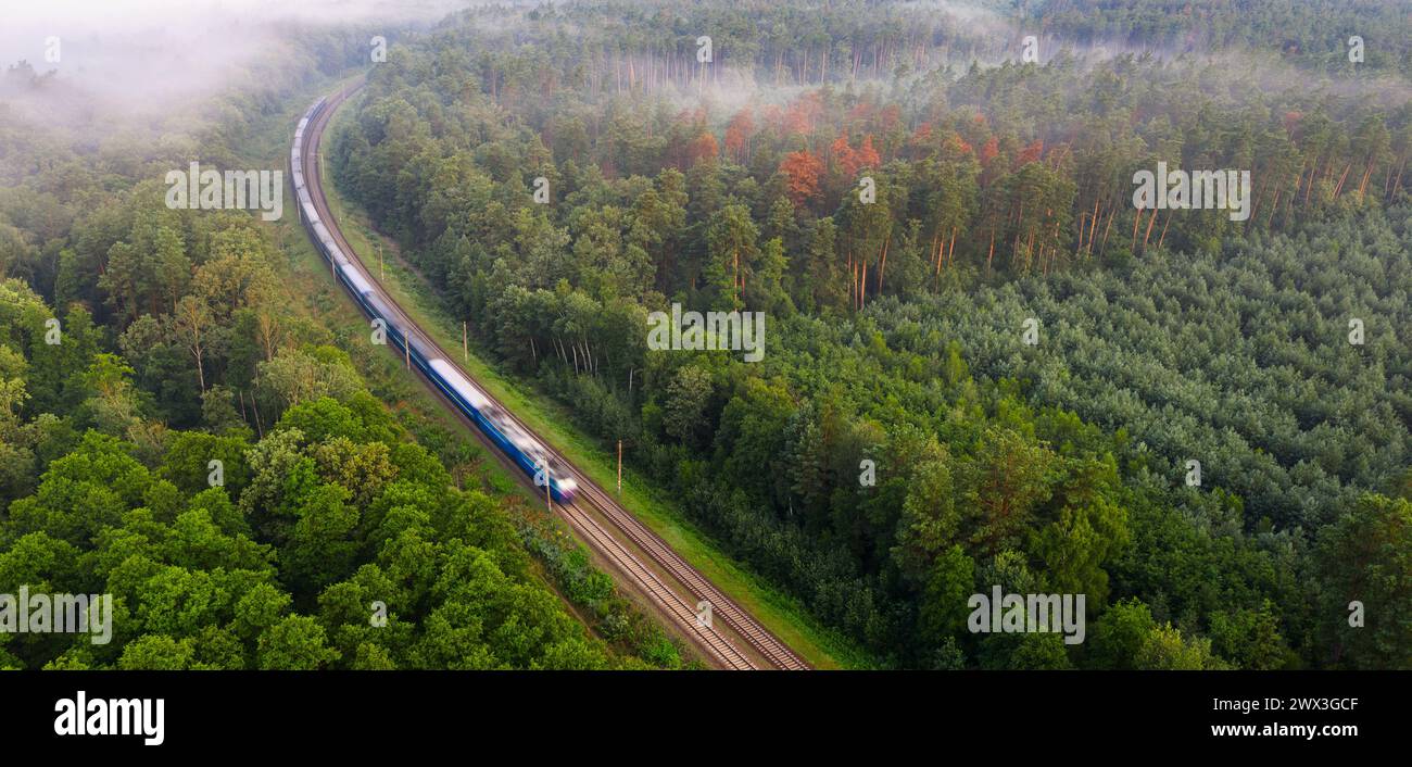 Train through mountain mist hi-res stock photography and images - Alamy