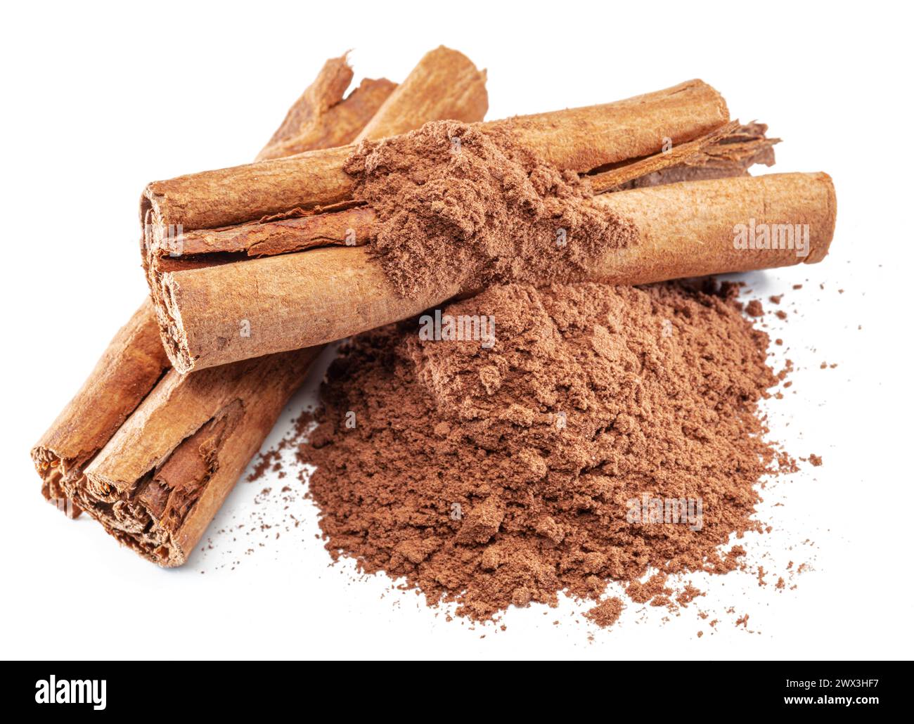 Cinnamon spice -dried bark strips and ground cinnamon isolated on white ...