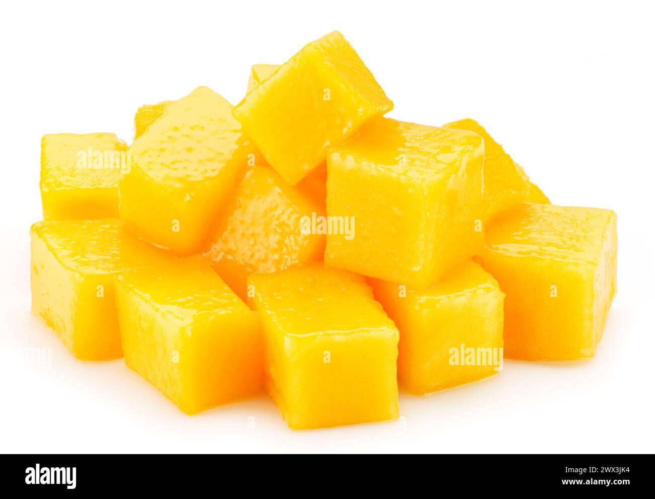 Mango fruit cubes isolated on white background Stock Photo - Alamy