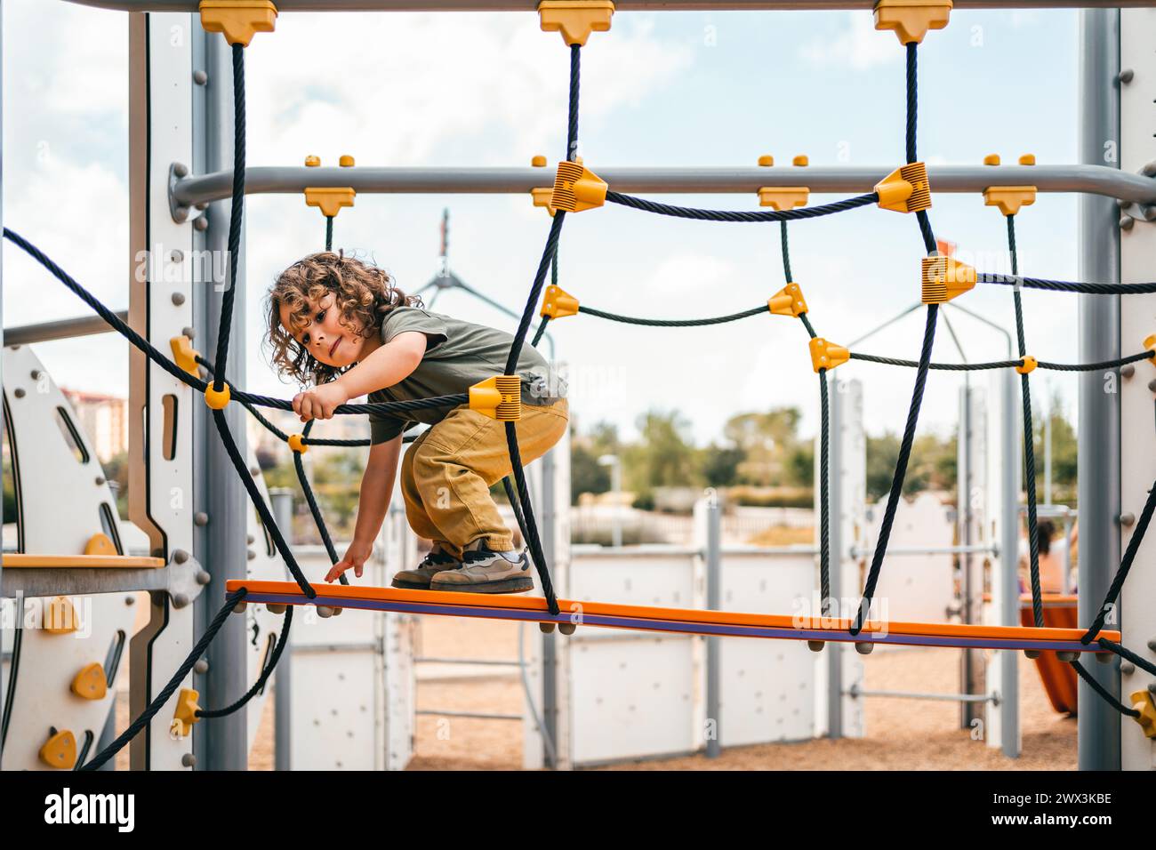 Little boy on walkway hi-res stock photography and images - Alamy
