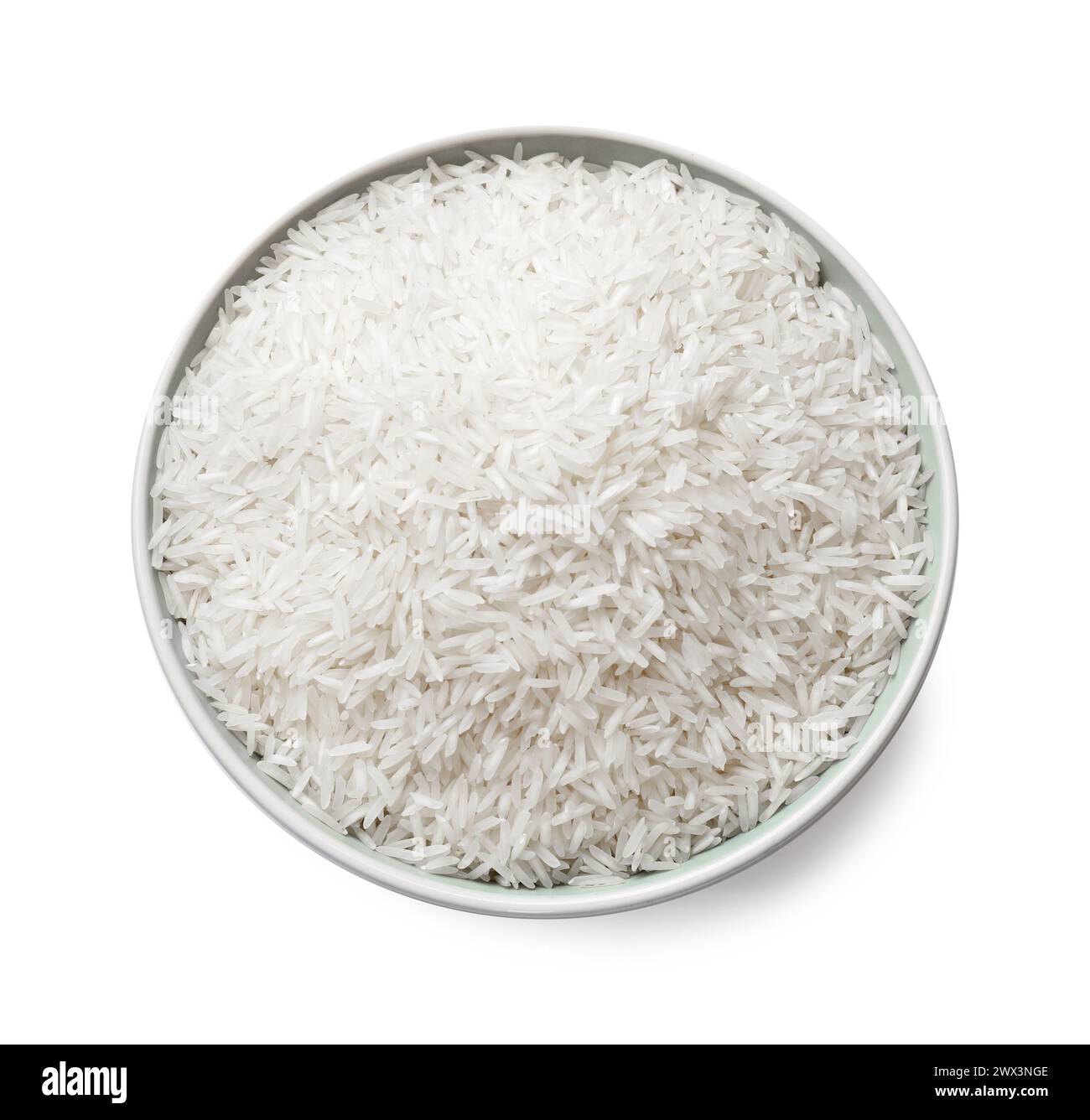 Raw basmati rice in bowl isolated on white, top view Stock Photo - Alamy