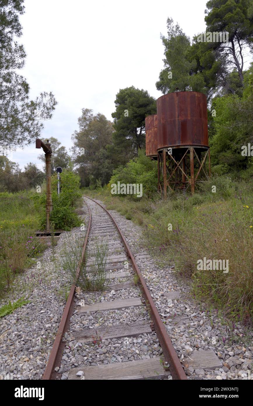 Disused abandoned railway line and water tower near Pyrgos, Peloponnese ...