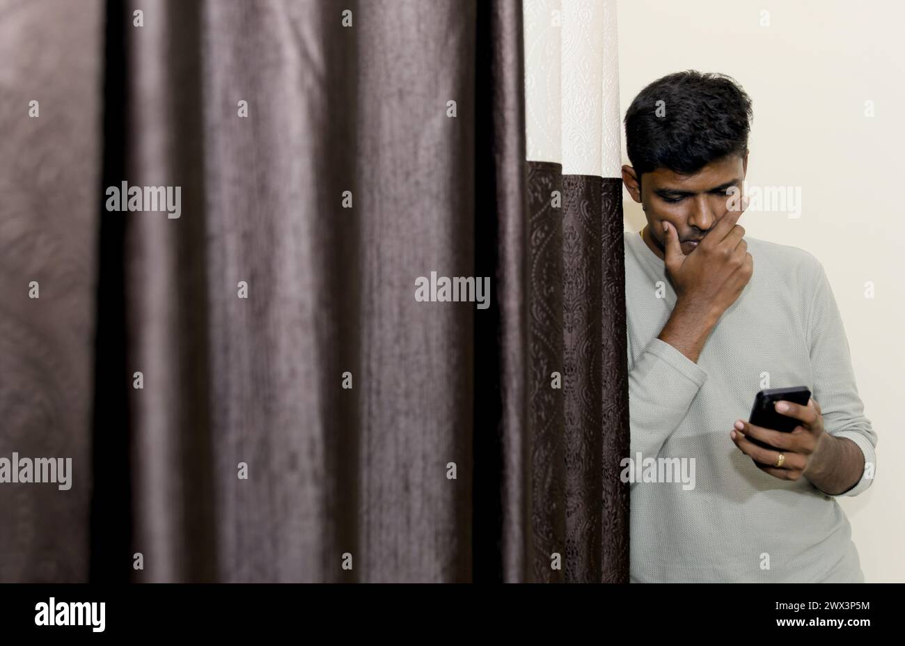 Furrowed brow asian man hi-res stock photography and images - Alamy
