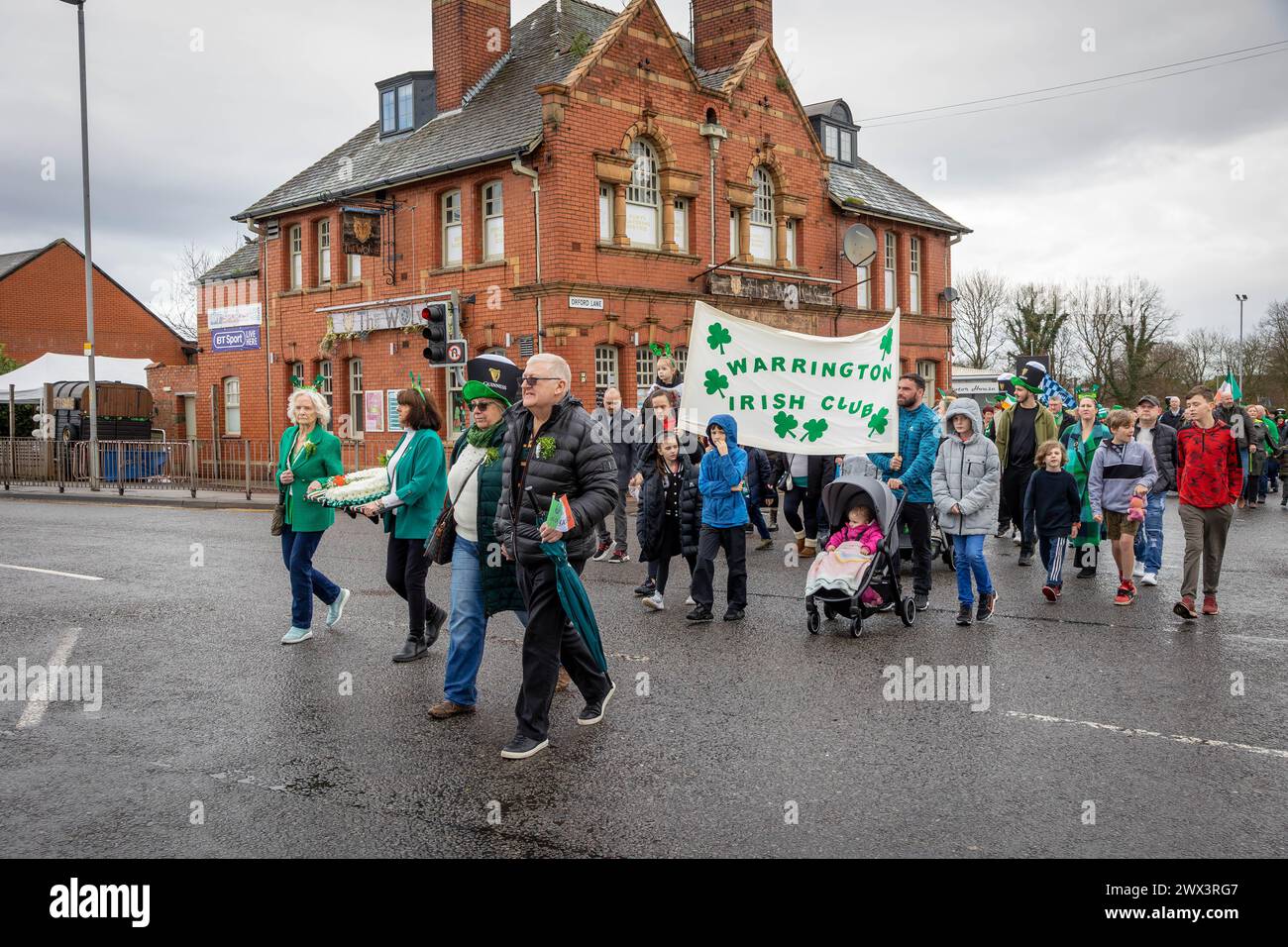 Warrington Irish Club join the procession at the 2024 St Patrick's Day ...