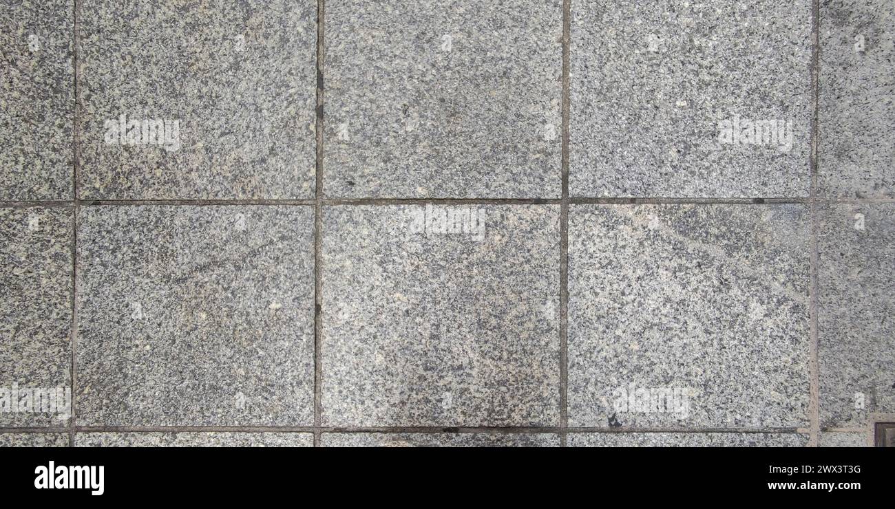 Sett pavement made with cut granite slabs. Monumental Complex road ...