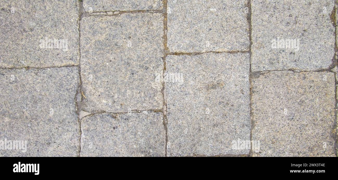 Sett pavement made with cut granite slabs. Monumental Complex road ...