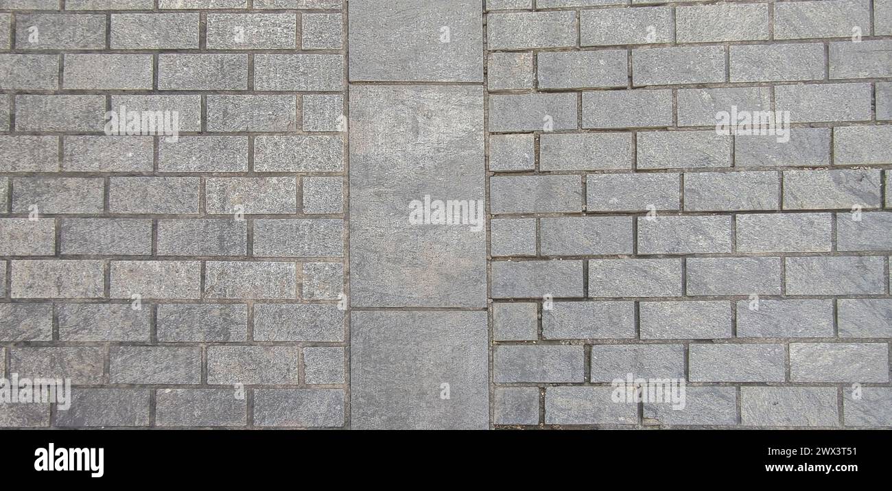 Sett pavement made with cut granite blocks. Monumental Complex road ...