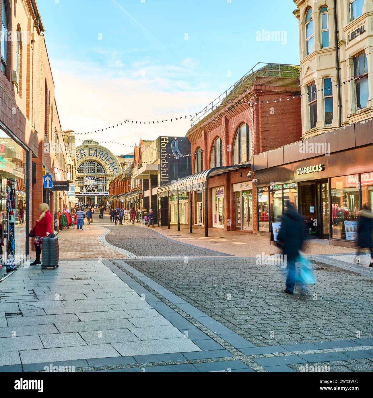 Shops,shoppers and other businesses along Victoria Street,Blackpool ...