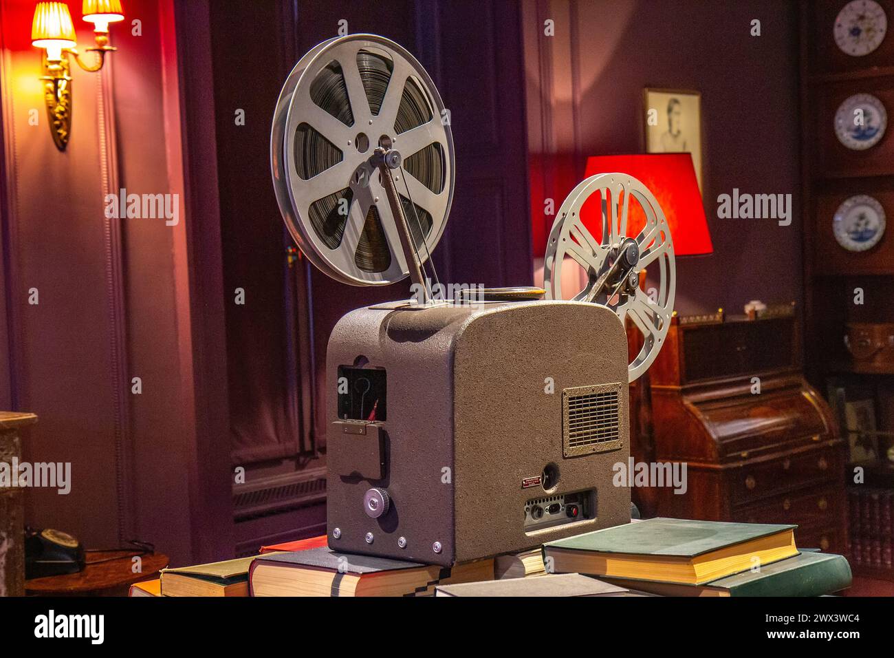 Vintage old projector with tape in the dark room in the house Stock ...