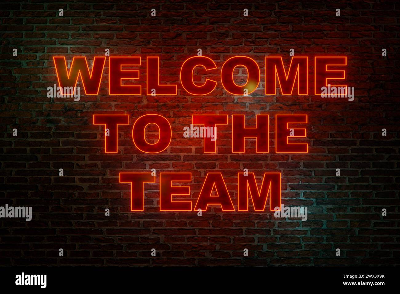 Welcome to the team. Welcome to the team. Brick wall at night with the ...