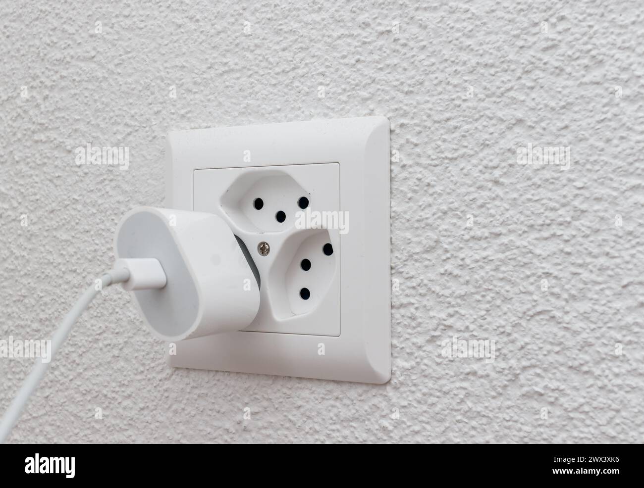 Electrical outlet with charger for mobile phone or tablet Stock Photo ...