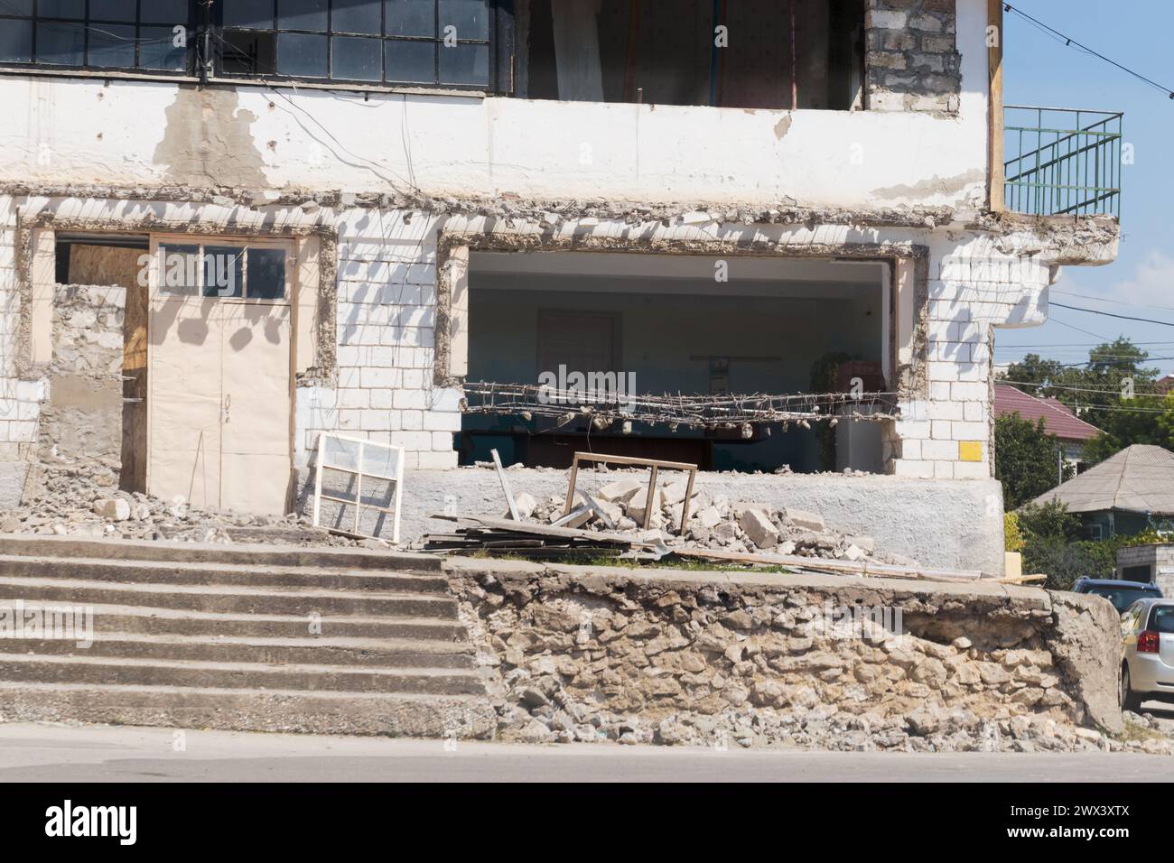 Post-war landscape. Destroyed building. War ruins. Destroyed city after ...