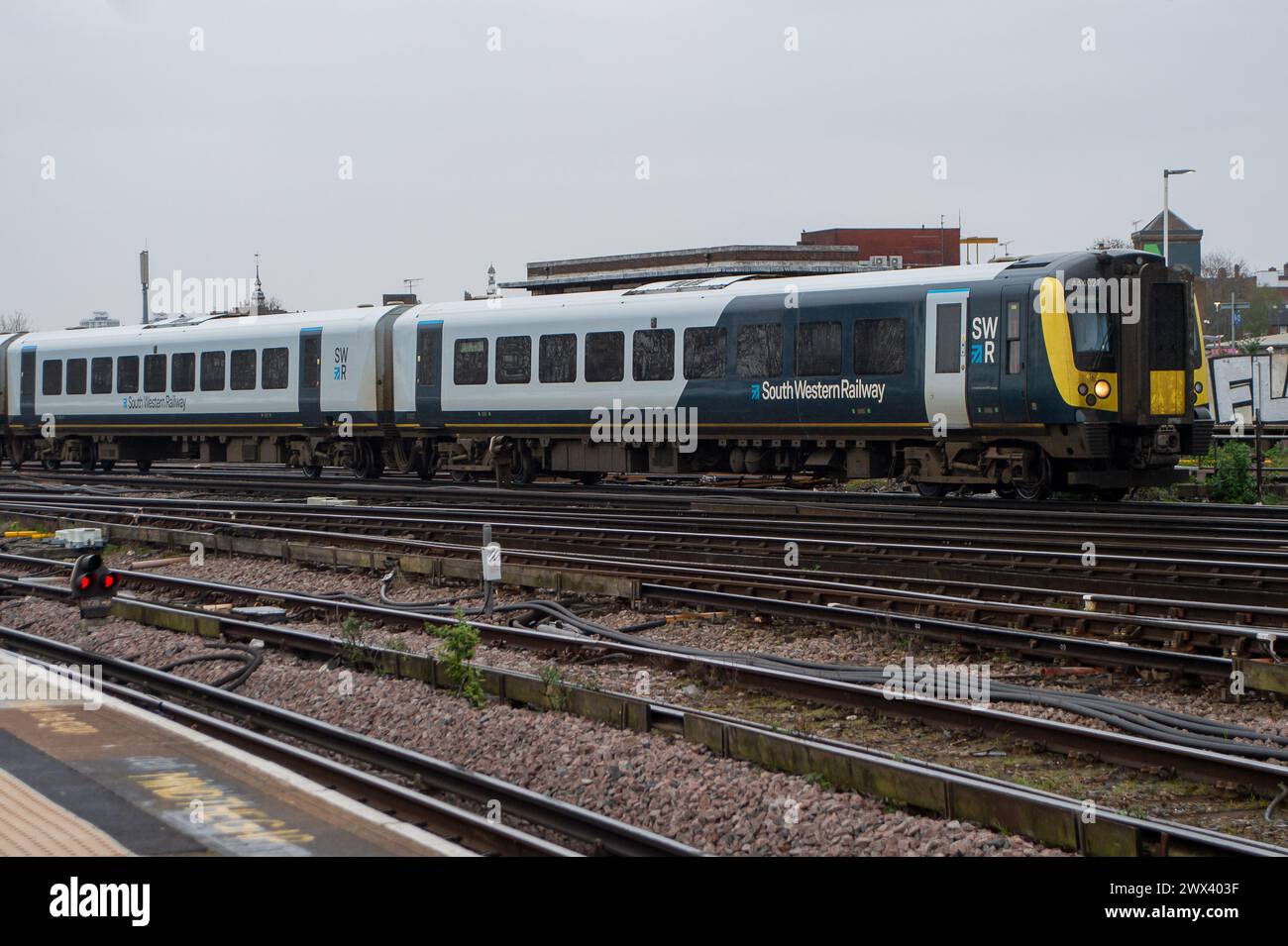 Clapham Junction, London, UK. 27th March, 2024. A South Western Railway train at Clapham ...