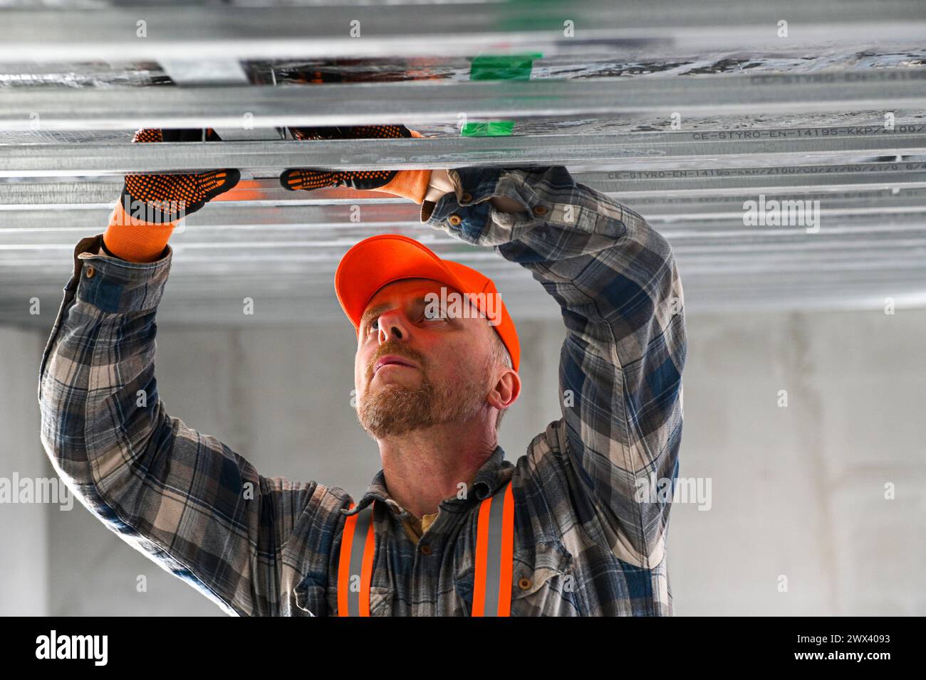 Plasterboard construction at home. installation of a metal frame on the ...