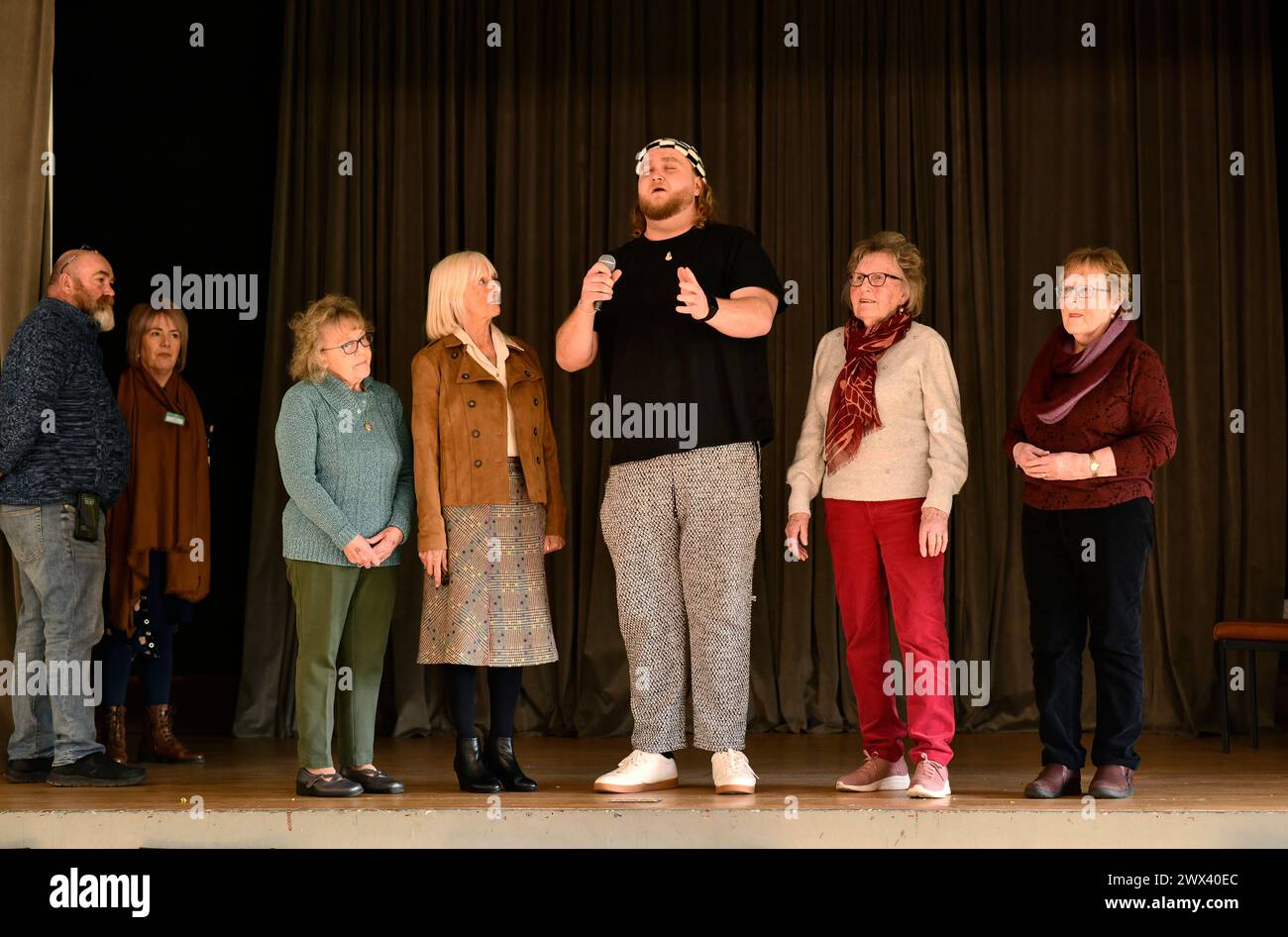 The 'Singing Builder' Callum Dougnie with admirers while rehearsing at ...